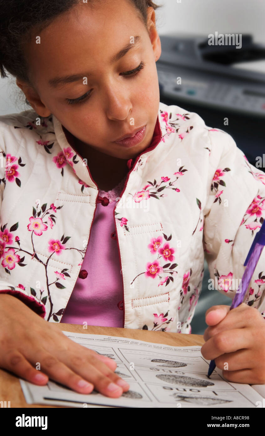 African American girl doing homework Stock Photo - Alamy