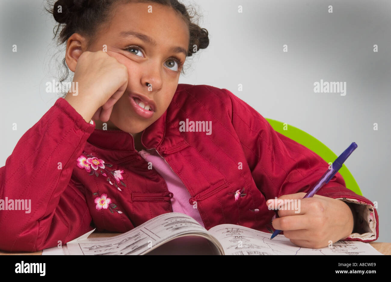 African American girl doing homework Stock Photo - Alamy