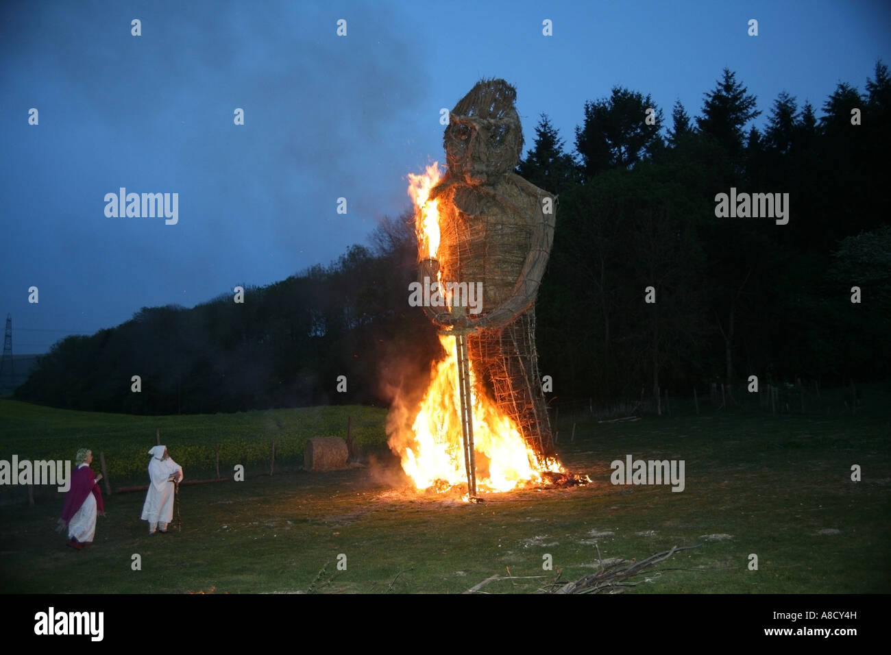 Burning of the Wicker Man with Druids looking on Stock Photo - Alamy