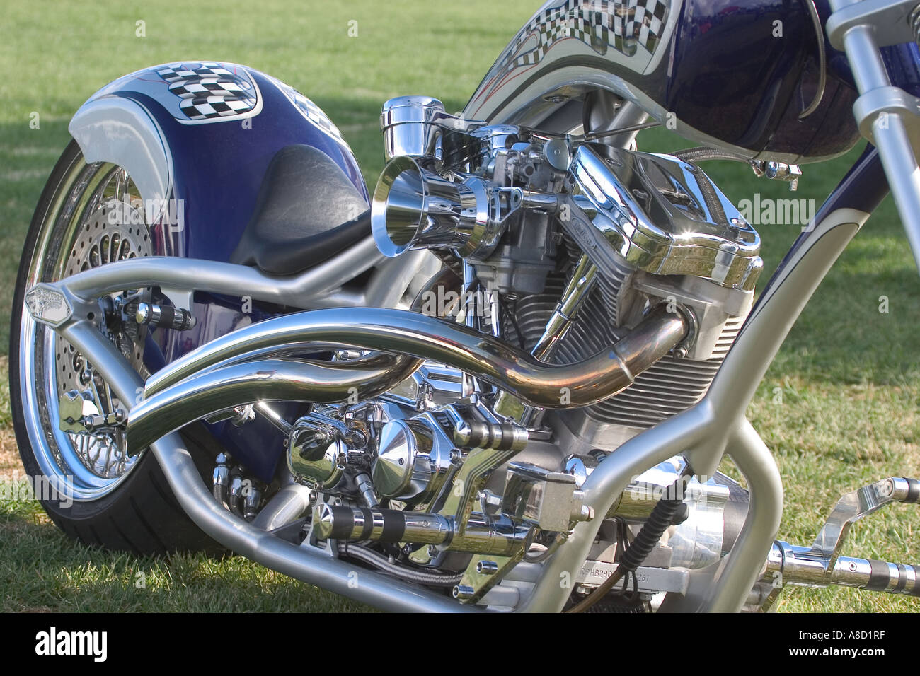 Custom motor cycle with a big motor and fancy paint job Stock Photo - Alamy