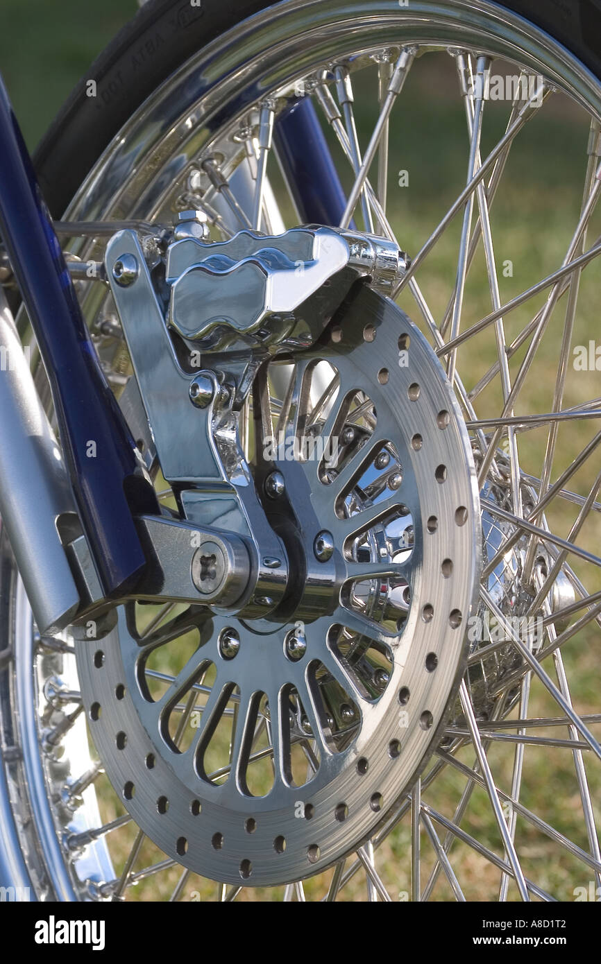Chrome disk brake on a custom motorcycle Stock Photo - Alamy