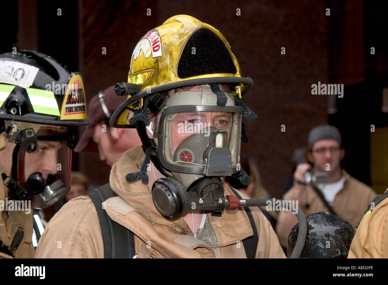 Firemen walking to the start of the Scott Firefighter Stair climb ...