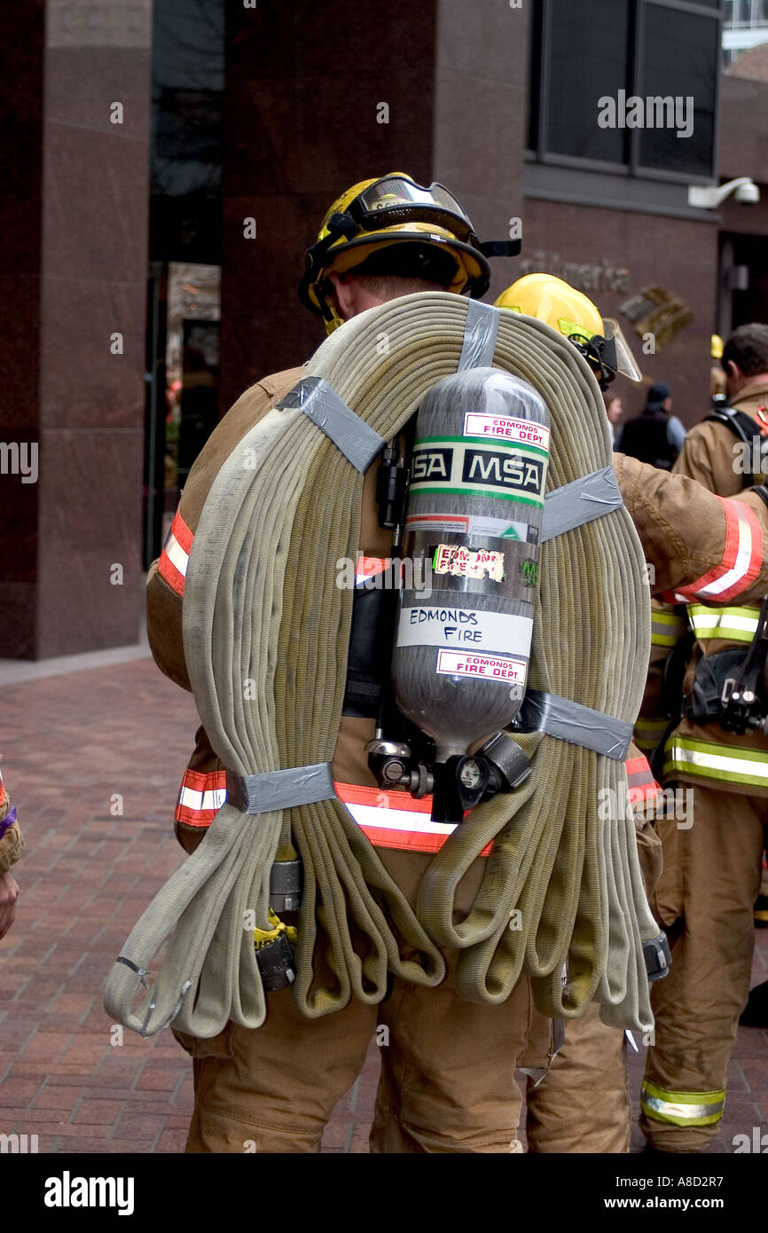Firemen walking to the start of the Scott Firefighter Stair climb ...