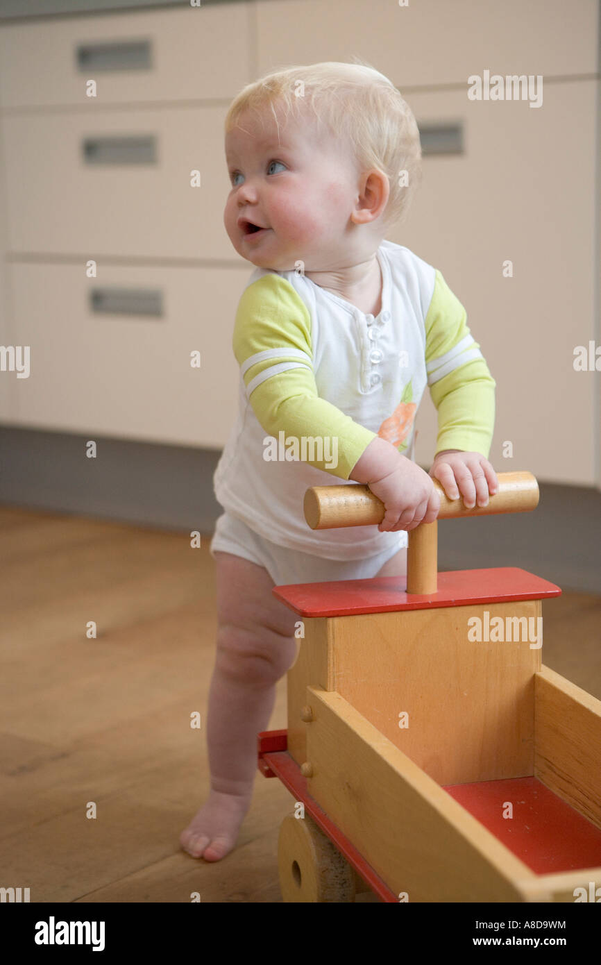 Child with a baby walker Stock Photo - Alamy