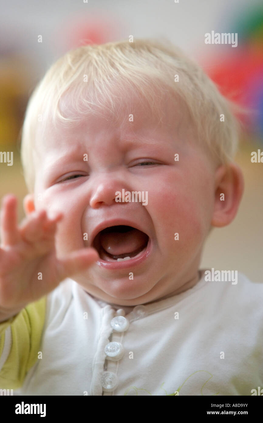 Portrait of a crying baby Stock Photo - Alamy