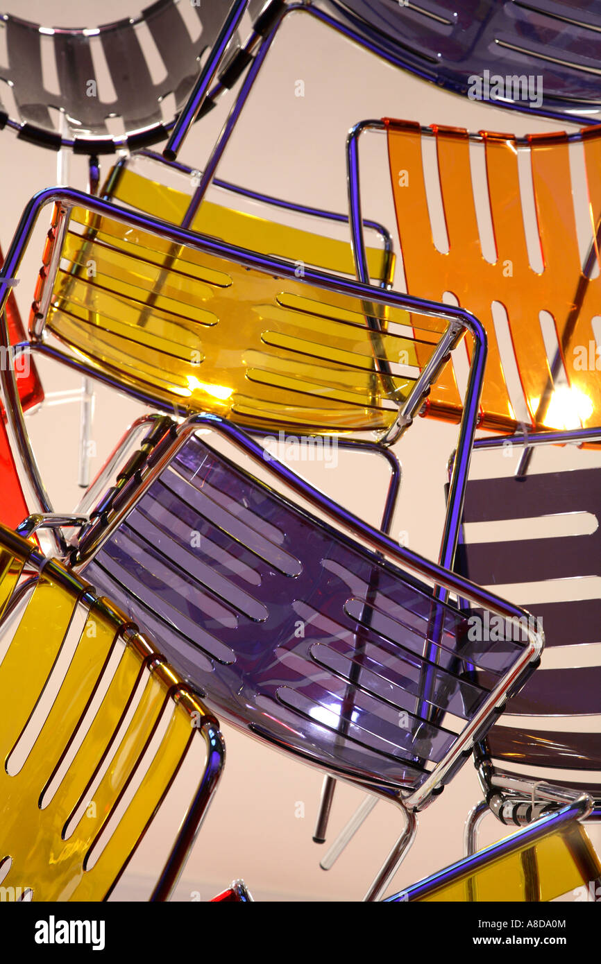 series of colored plastic chairs Stock Photo - Alamy