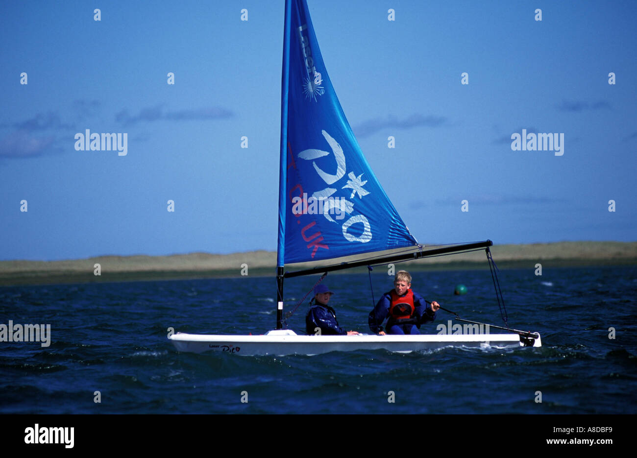 Kids dingy sailing Stock Photo - Alamy