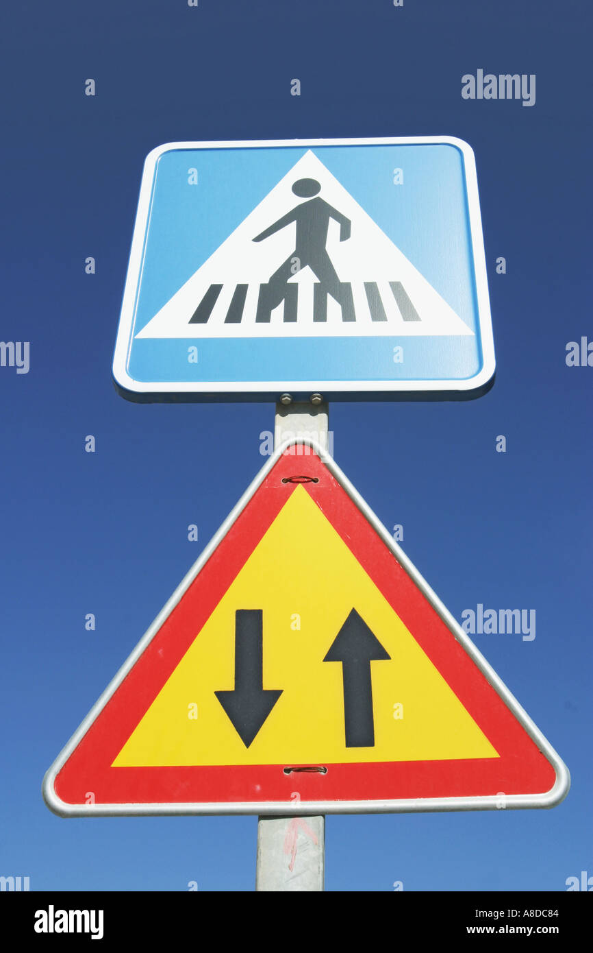 Pedestrian crossing and no two way traffic sign Stock Photo - Alamy