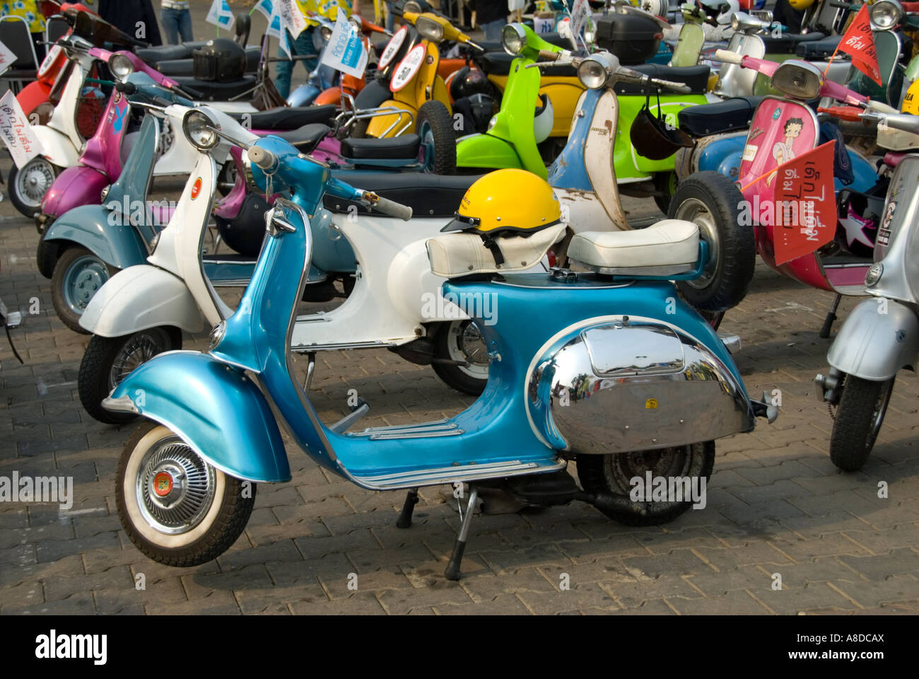 Rows of parked motor scooters Stock Photo - Alamy