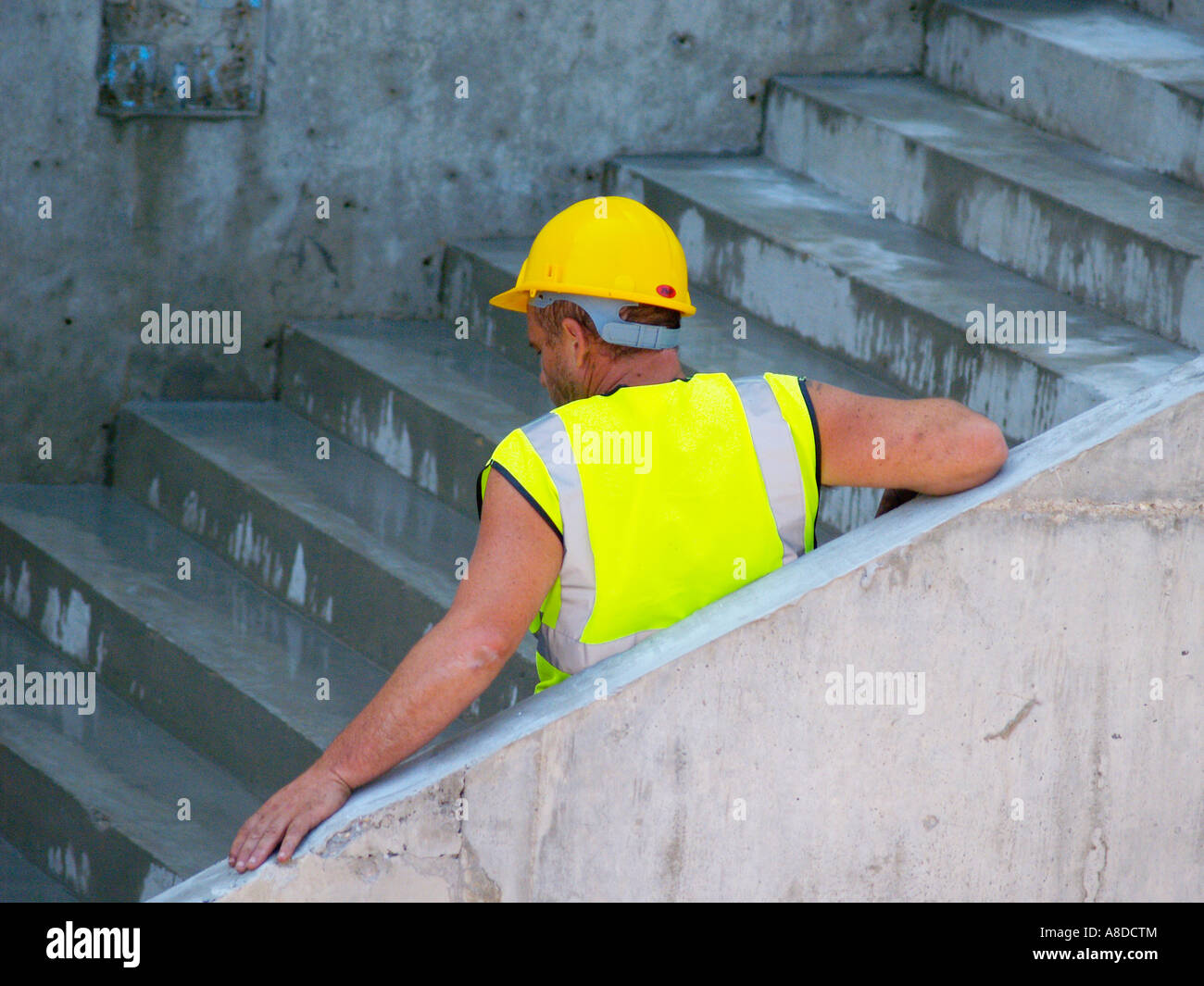 Construction worker taking a break Stock Photo - Alamy