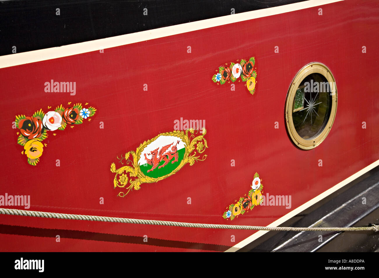 Painted side of canal boat with Welsh dragon Monmouthshire and Brecon ...
