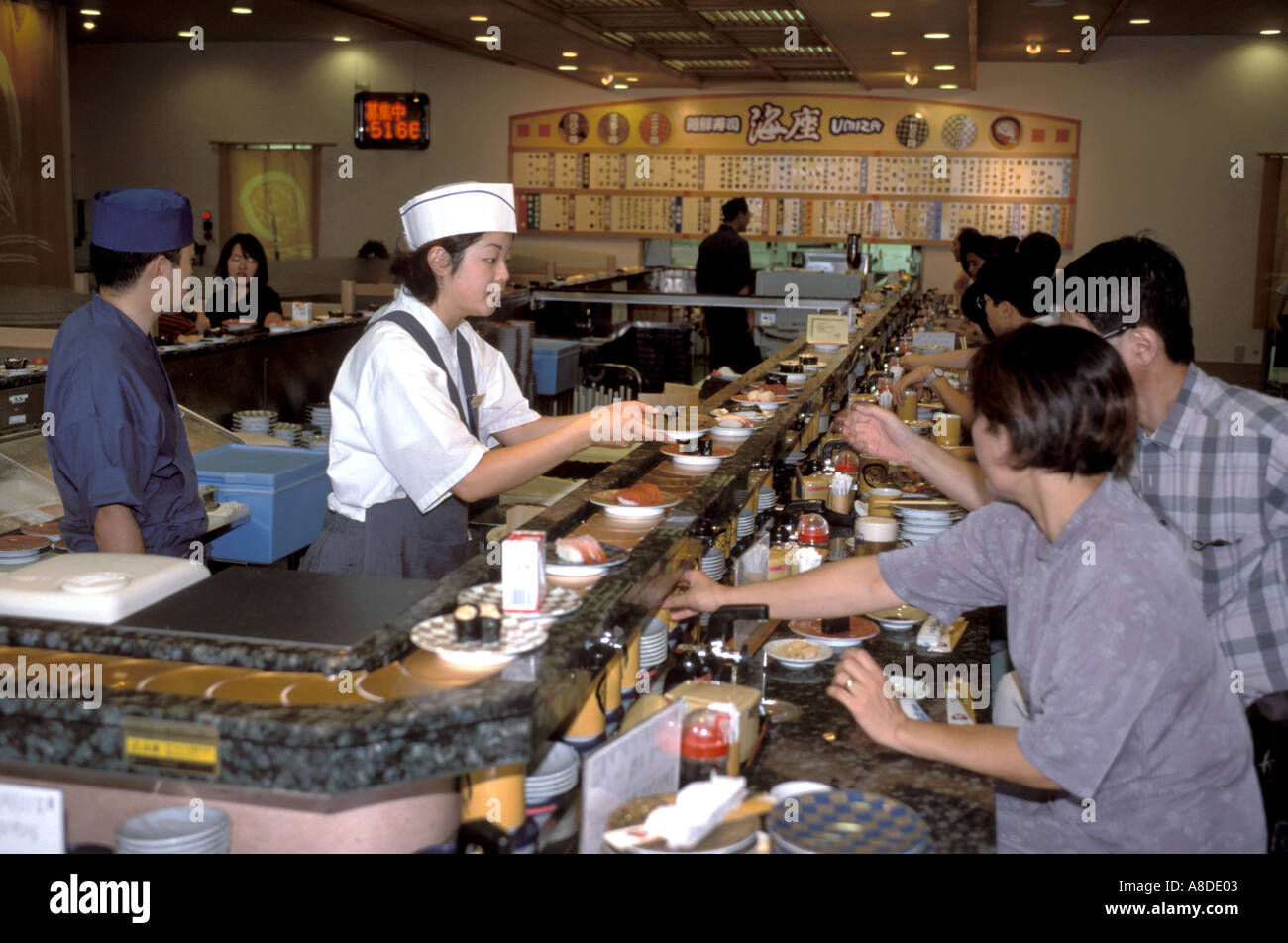 Moving sushi restaurant hi-res stock photography and images - Alamy