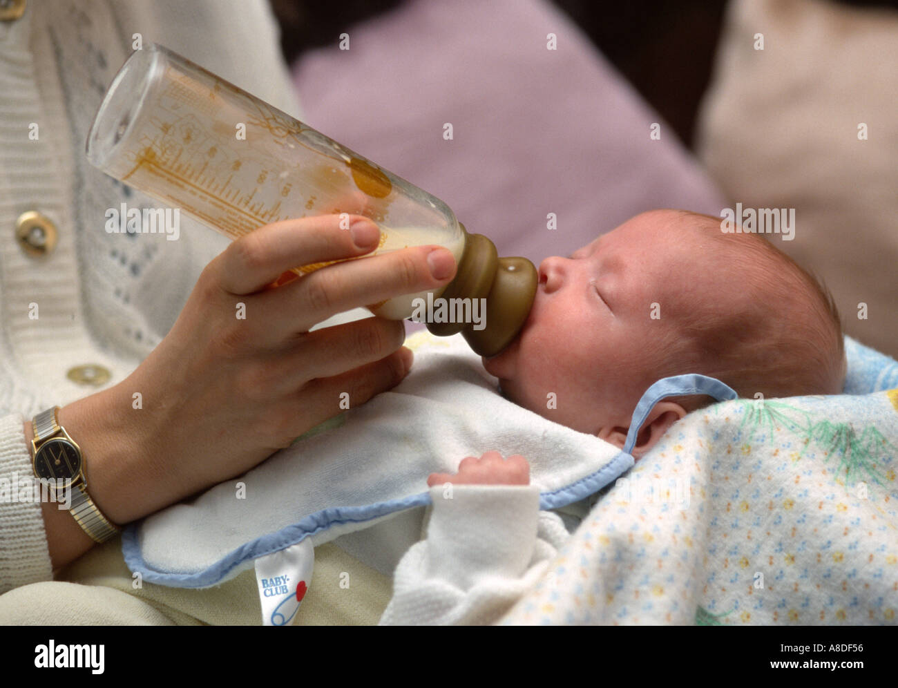 Baby is drinking Stock Photo - Alamy