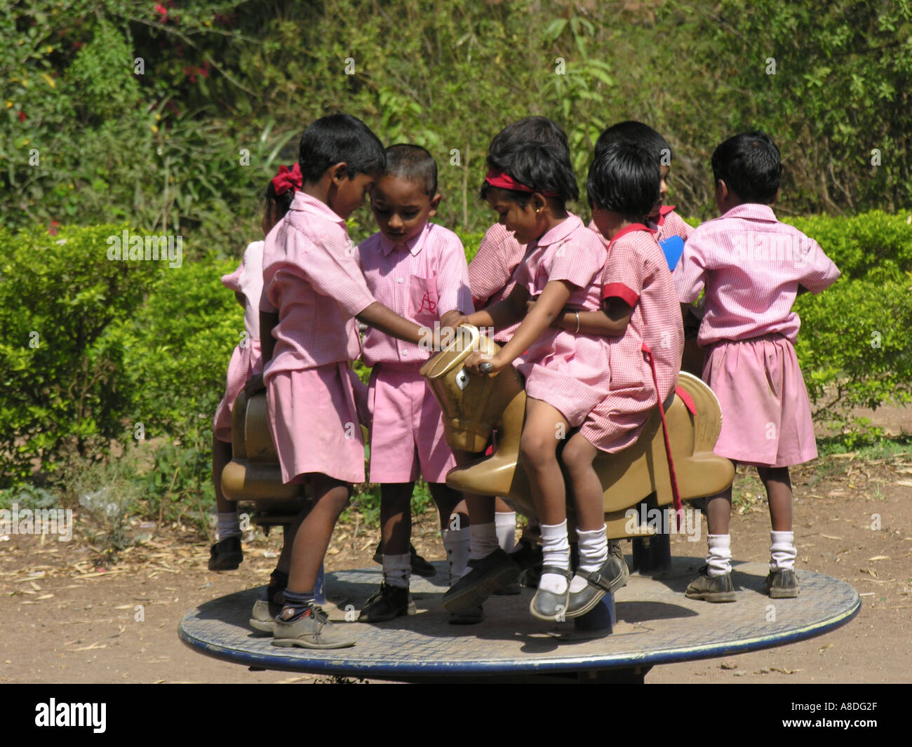NMJ98660 School Children Playing at a Children Park Pune Maharashtra India Stock Photo - Alamy