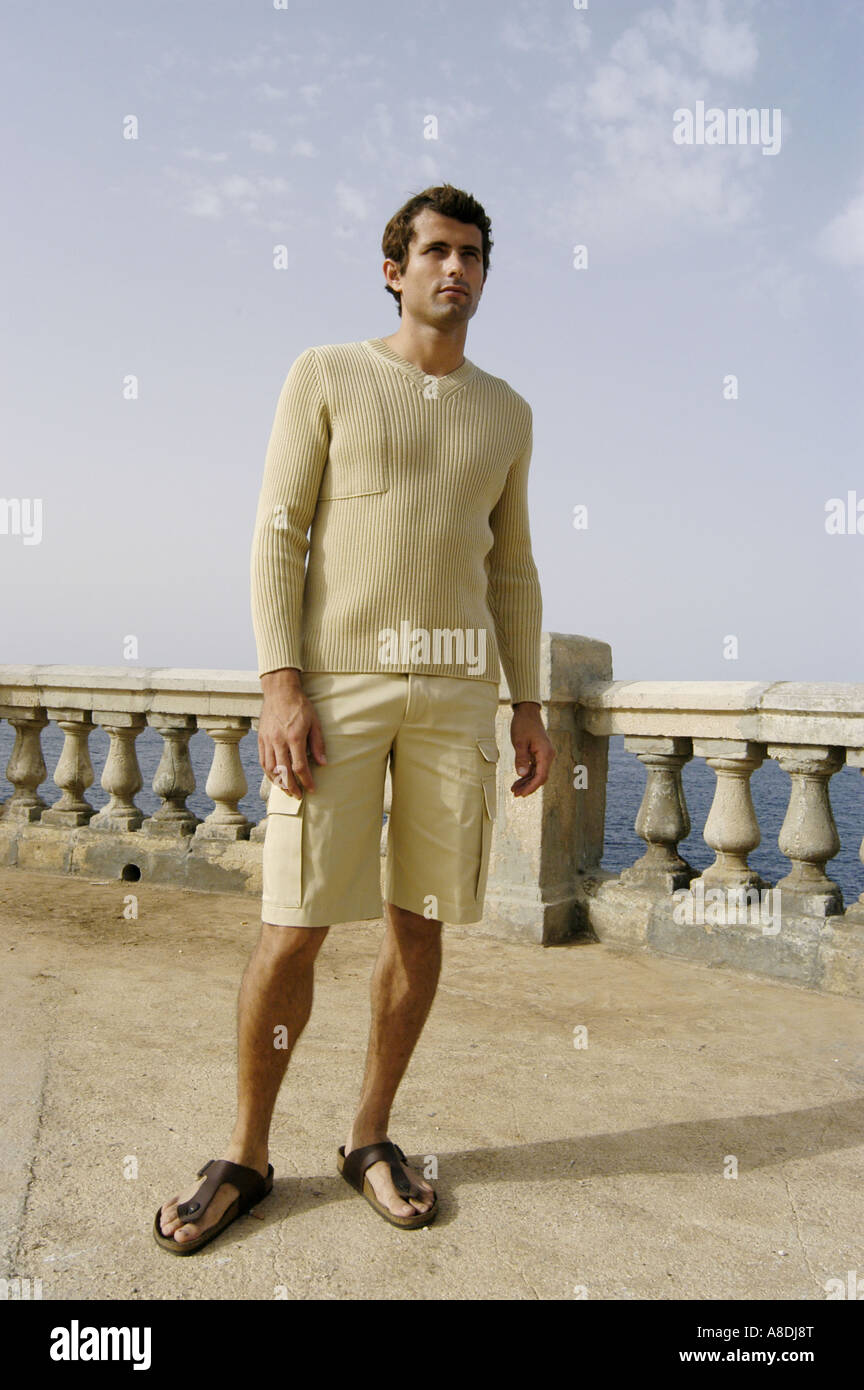 Male model modelling Spring clothes on a Pier Malta Stock Photo - Alamy