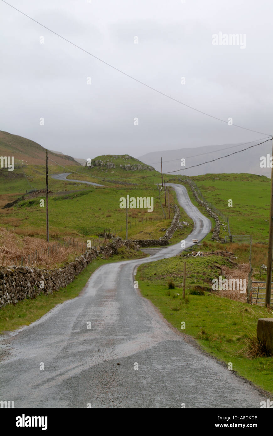 Road single track solitary highway lane roadway Stock Photo - Alamy