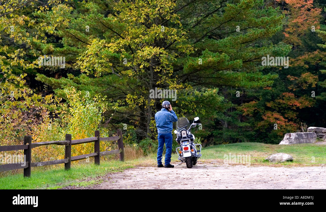A motorcylist at a rest stop Stock Photo - Alamy