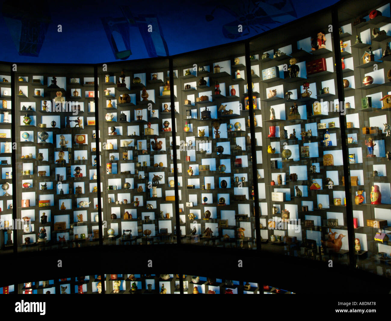 Museum display of an exhibition about collecting with hundreds of money ...