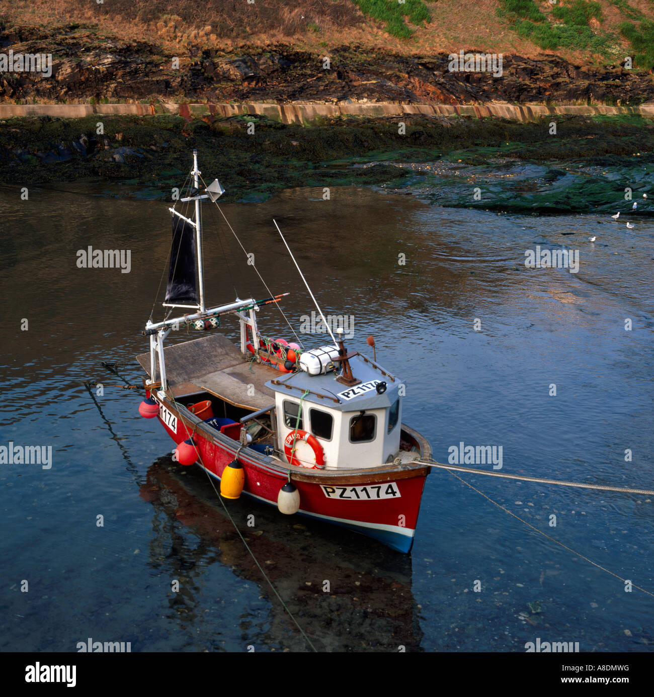 Red fishing boat in Boscastle, Cornwall, UK Stock Photo - Alamy