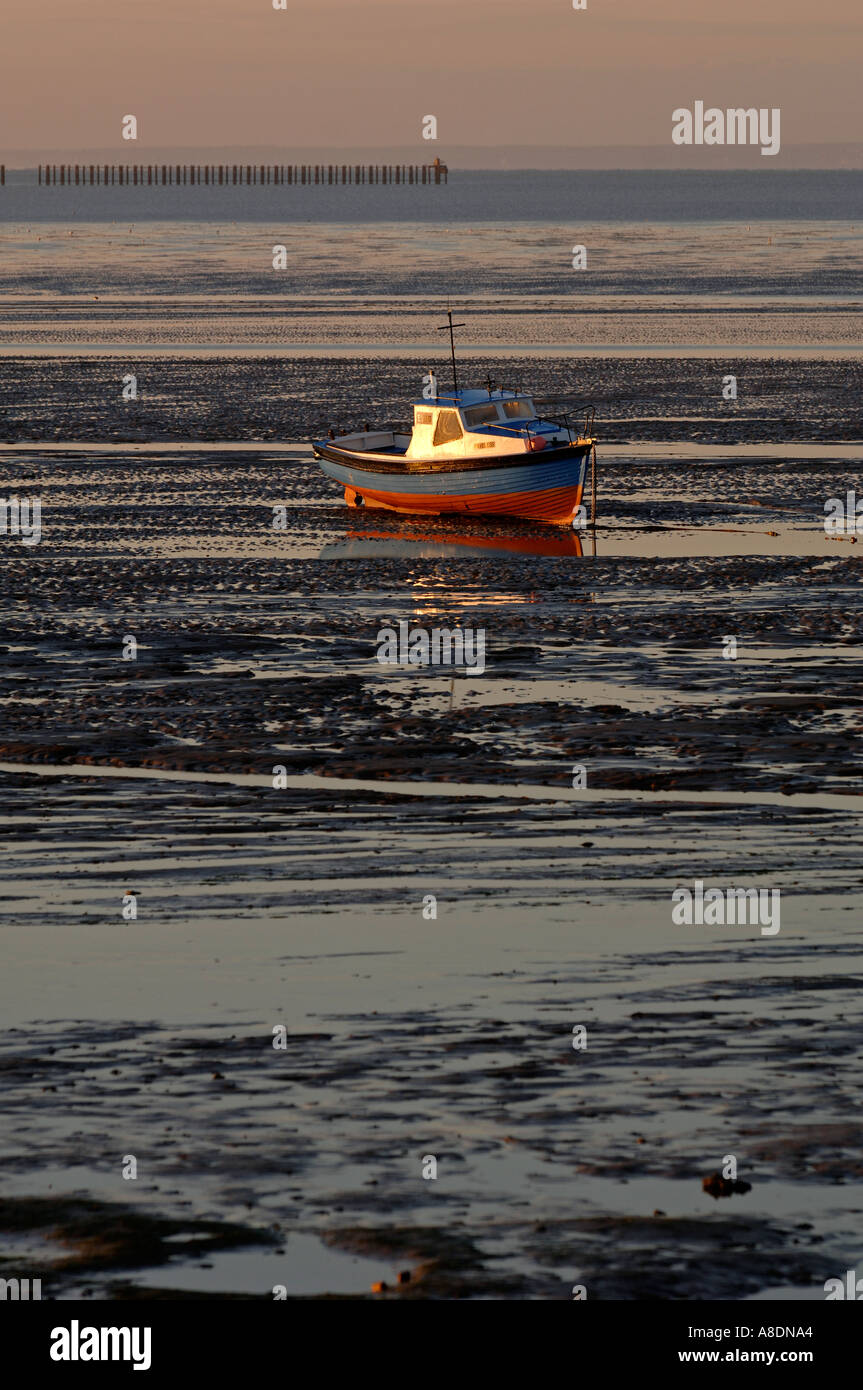 Boat on mudflats in Shoeburyness on the Essex coast England UK Stock ...