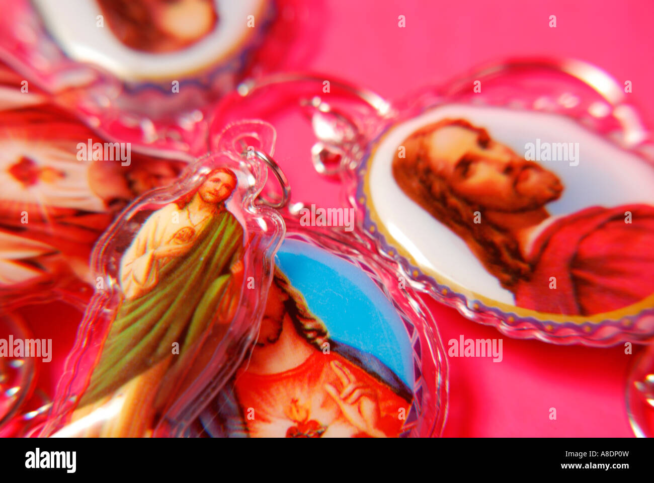 Several Jesus Keyrings Stock Photo - Alamy