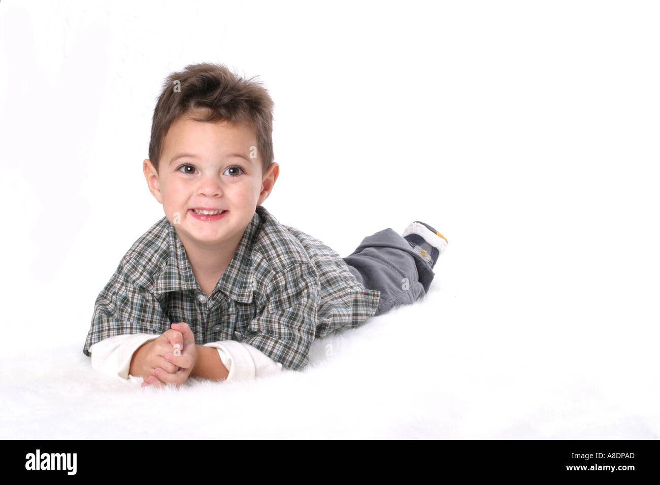 Little Boy Laying Down Stock Photo - Alamy