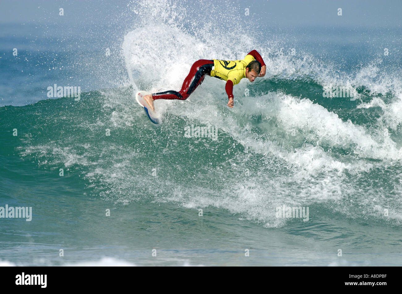 Surfer riding a Wave Stock Photo - Alamy