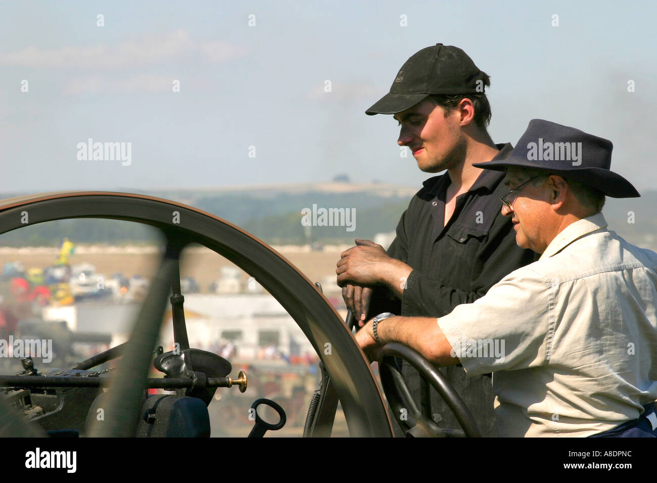 Traction engine operators at Dorset Steam Fair, England, UK Stock Photo ...