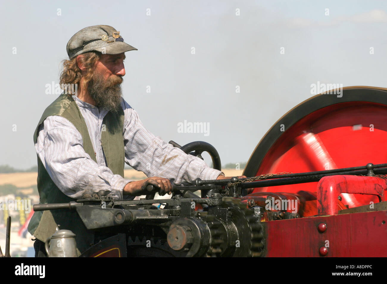 Traction engine operator at Dorset Steam Fair, England, UK Stock Photo ...