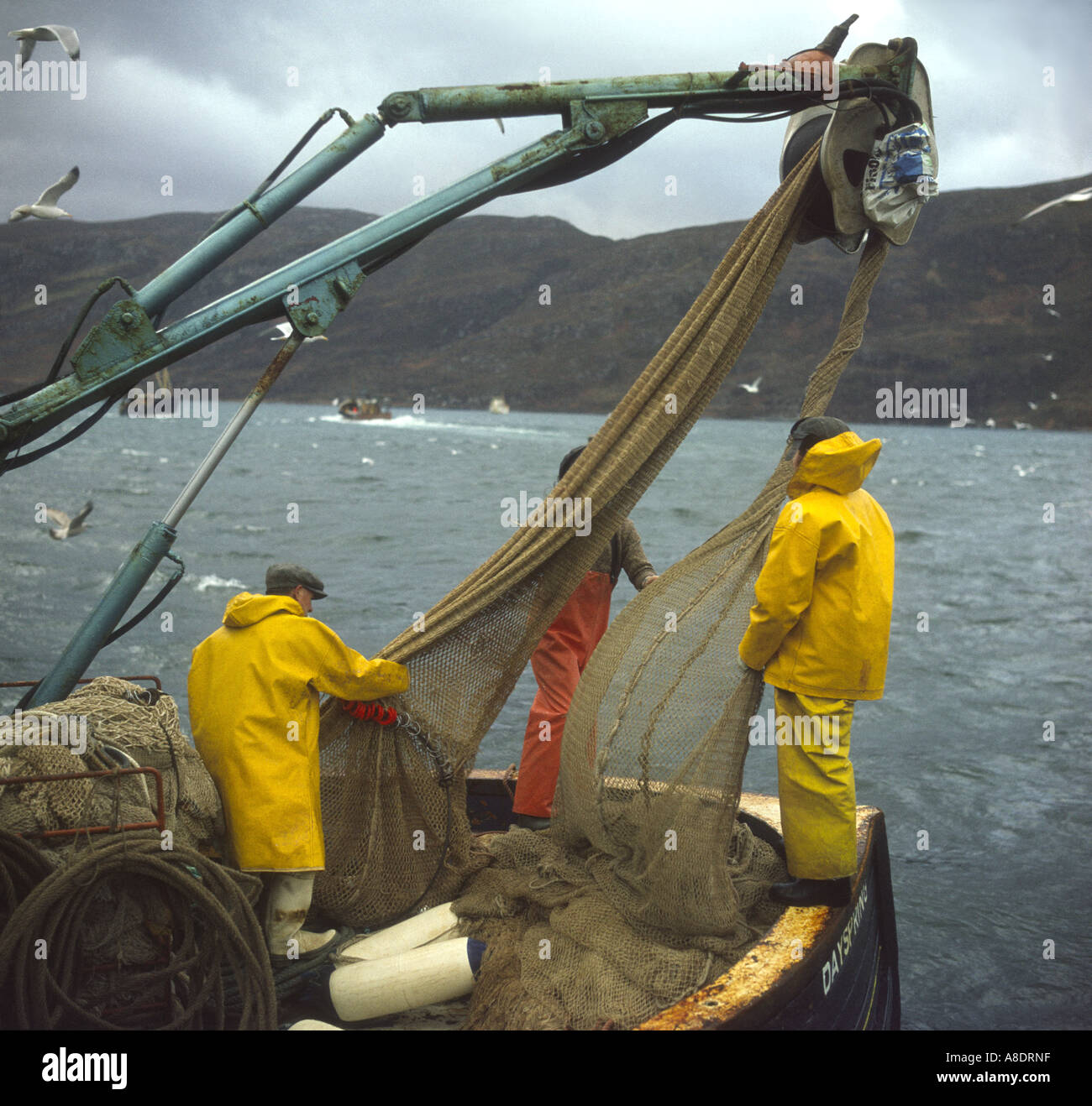 Fishermen at Work Stock Photo - Alamy