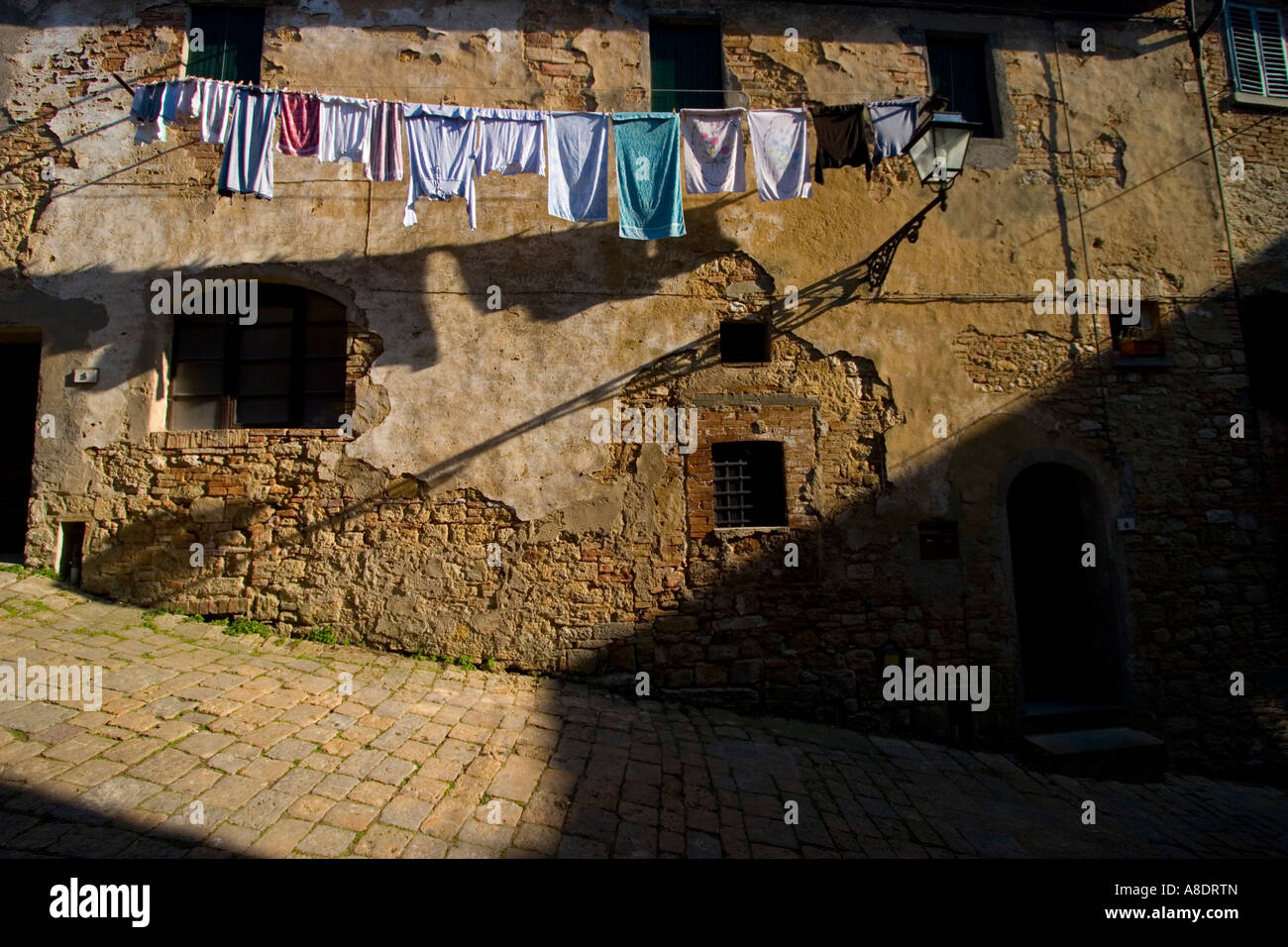 Washing hanging out on a line in San Gimignano, Tuscany, Italy Stock ...