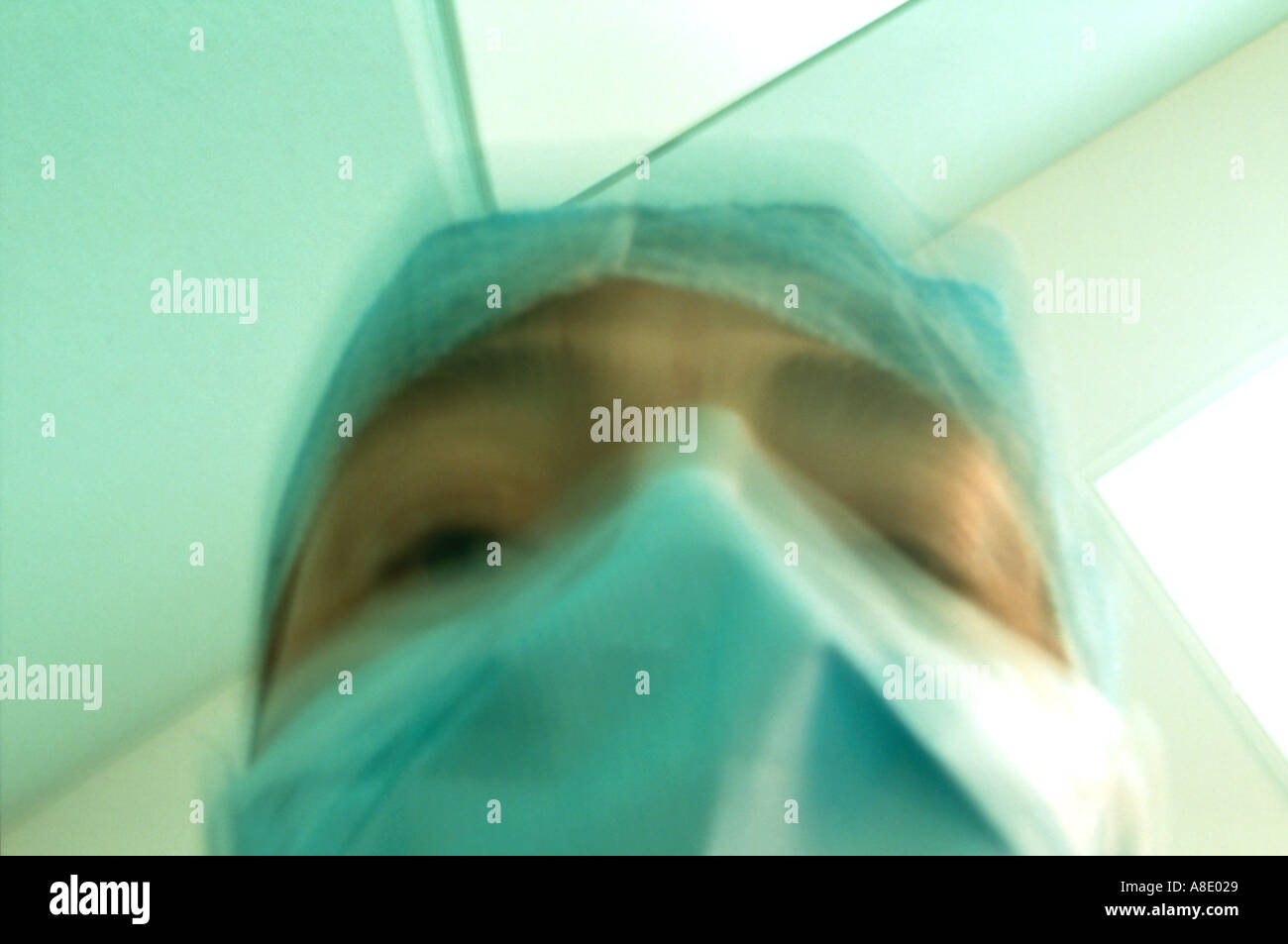 Surgical mask on man s face in hospital operating room Stock Photo - Alamy