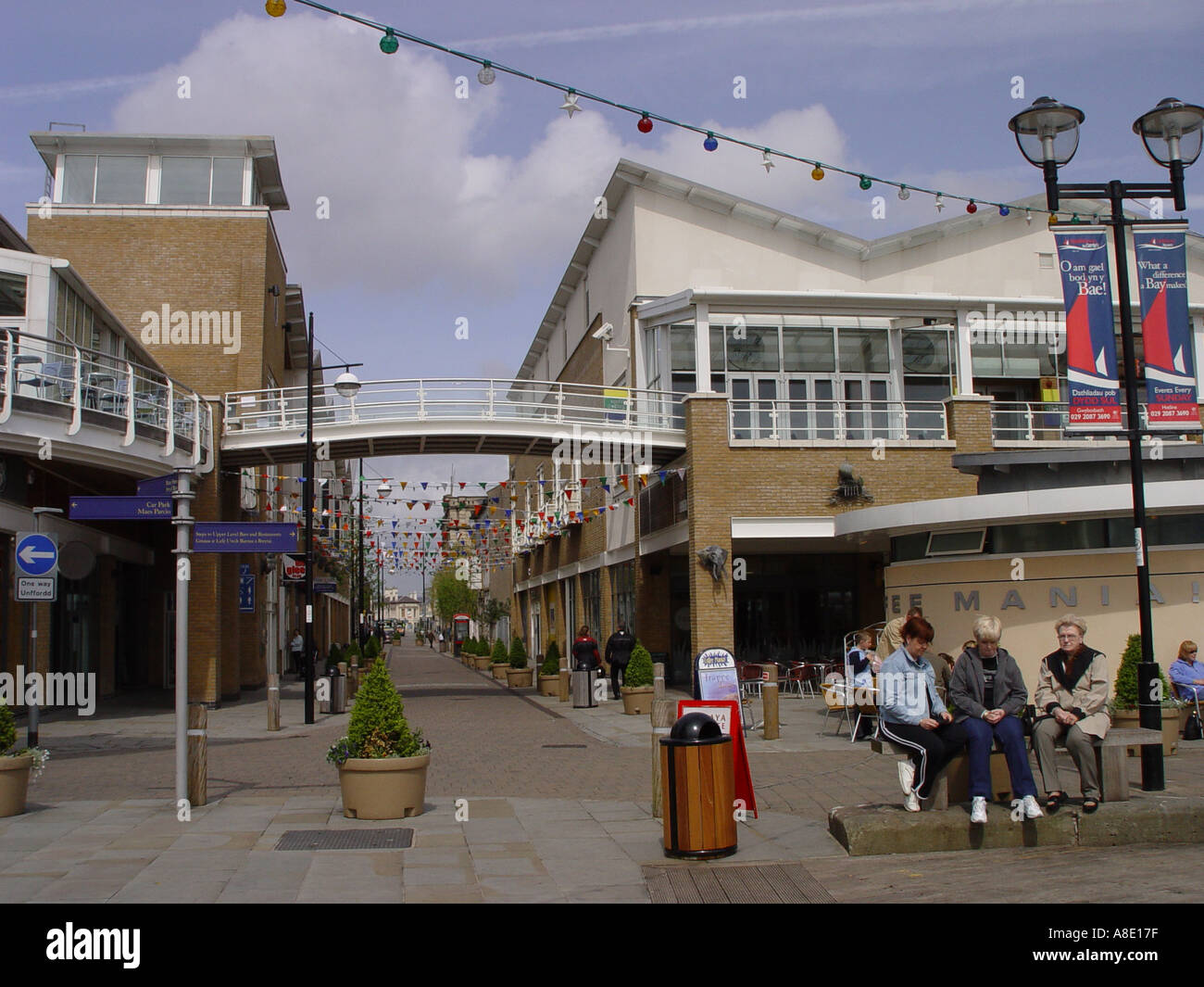 Tourists and visitors at Mermaid Quay shopping area at Cardiff Bay in ...