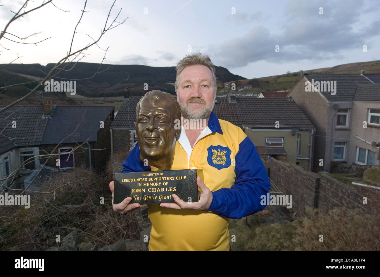 Phil Cope Director of the Gentle Giant Trust holding a bronze bust of ...