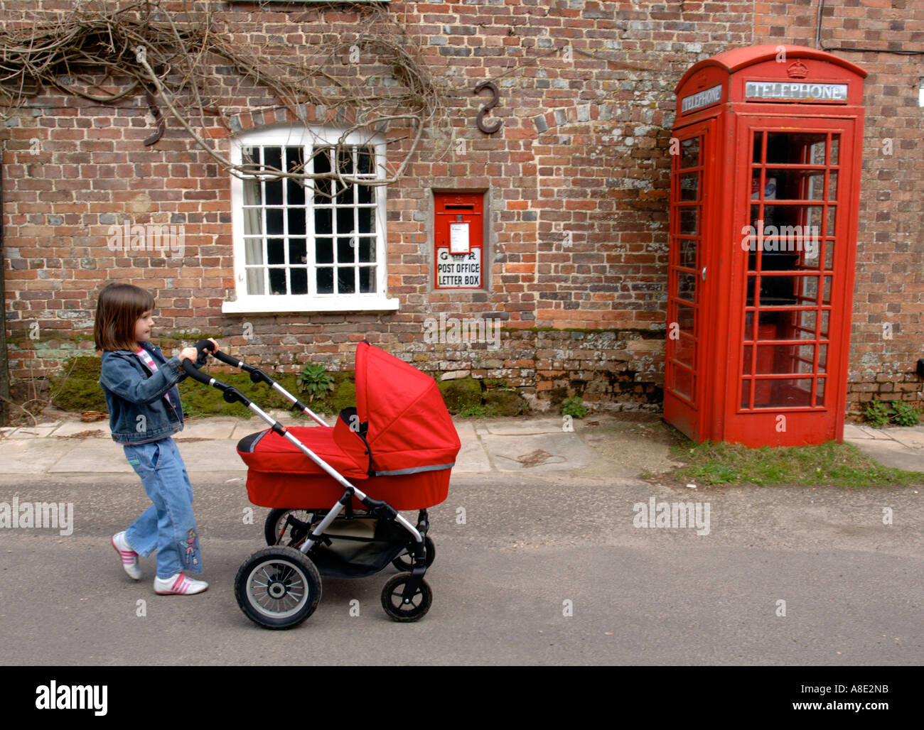 Girl pushing pram hi-res stock photography and images - Alamy