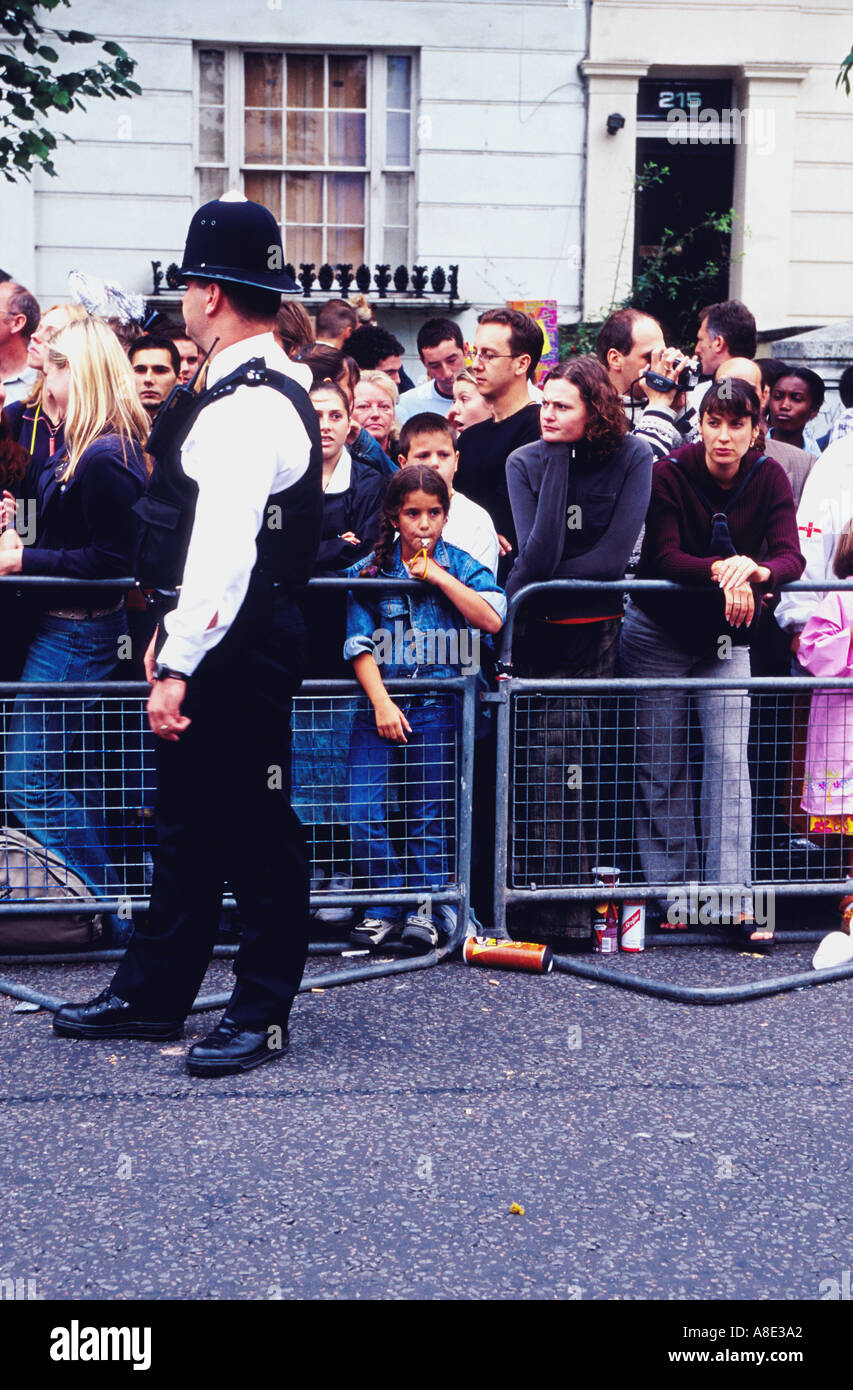 NOTTINGHILL CARNIVAL GIRL BLOWING WHISTLE LONDON UK Stock Photo - Alamy