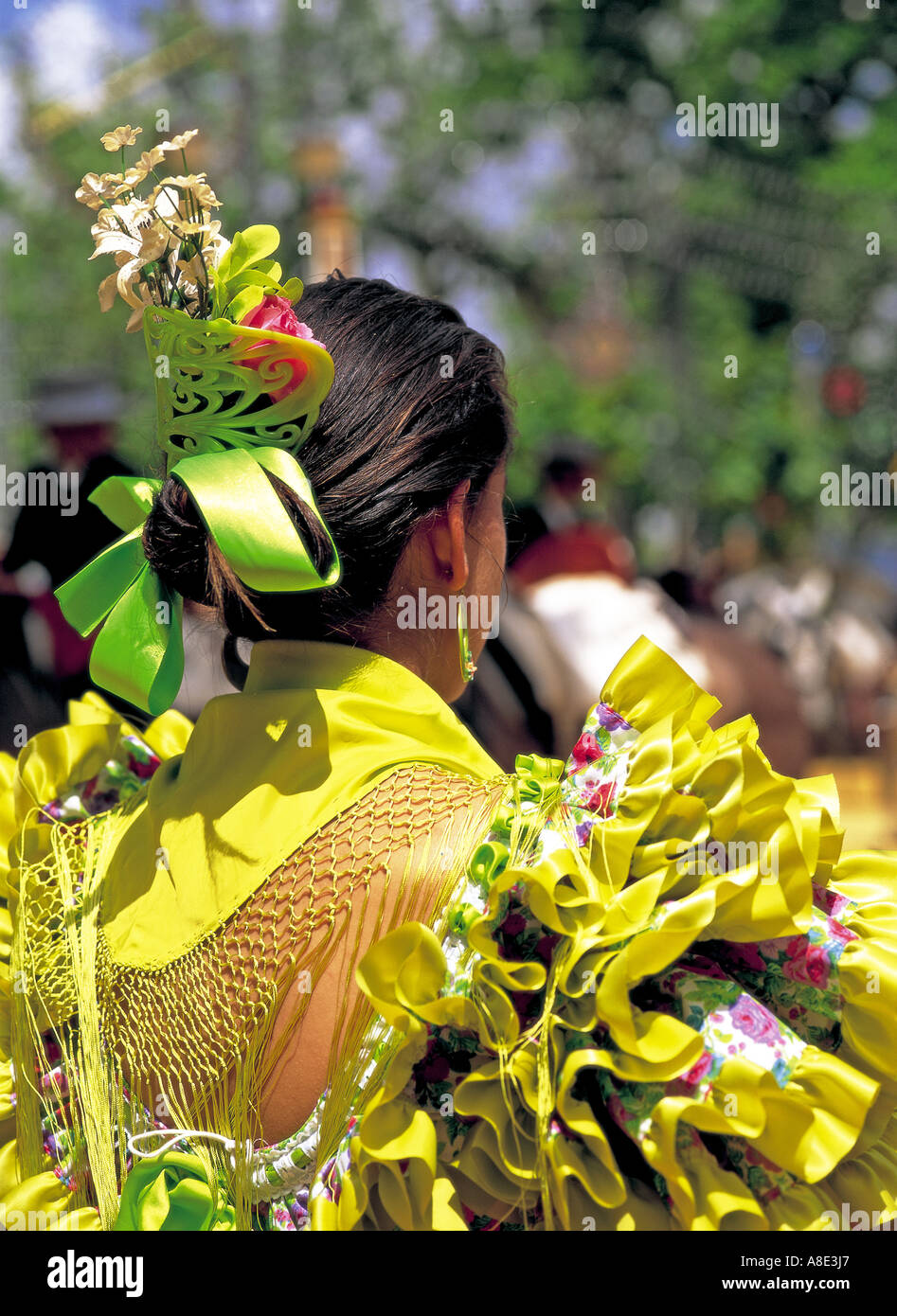Spanish woman in flamenco costume at horse fair, Jerez de la Frontera ...