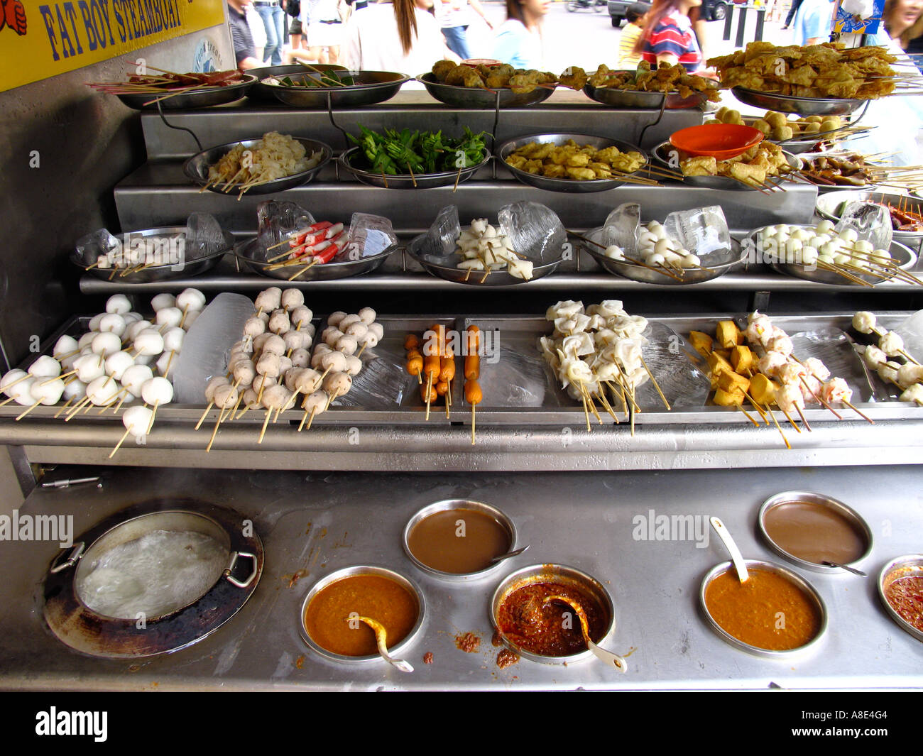 Foodstall with asian snacks Stock Photo - Alamy