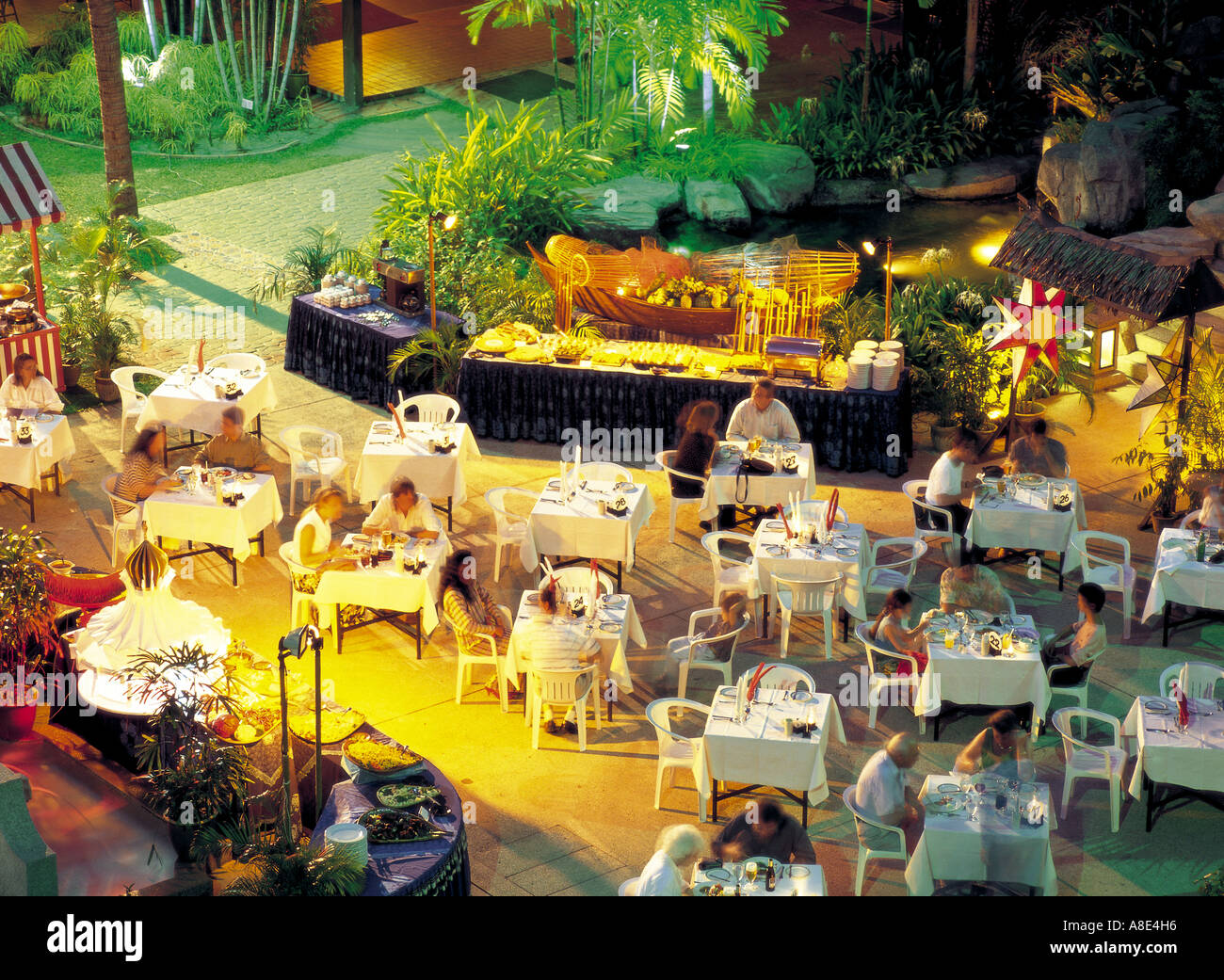 Resort hotel outdoor dining Malaysia Stock Photo - Alamy