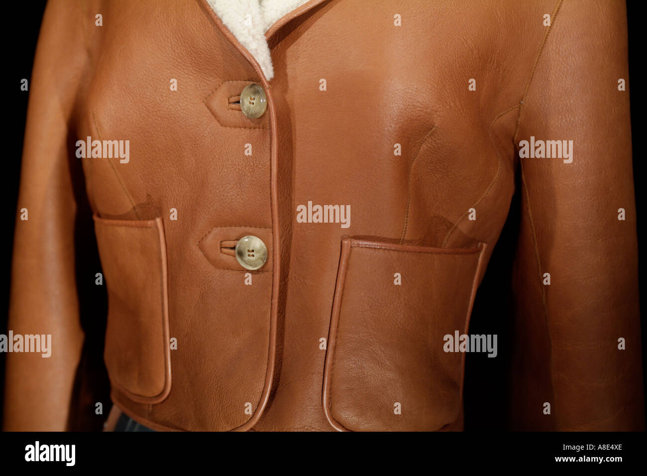 Store Window Display of a Womens Leather Coat Stock Photo - Alamy