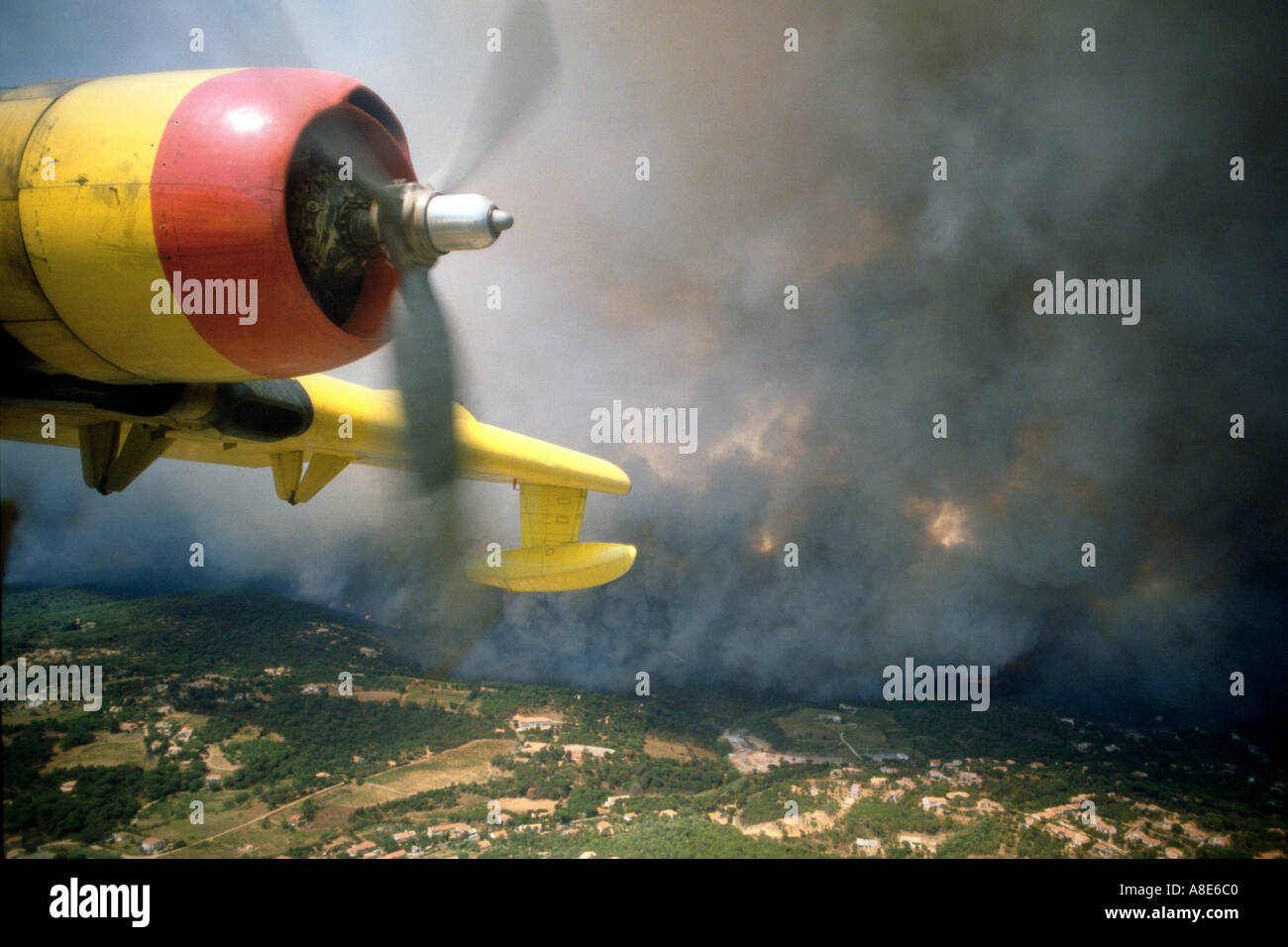 Canadair firefighting water bomber airplane's engine and aerial view of ...