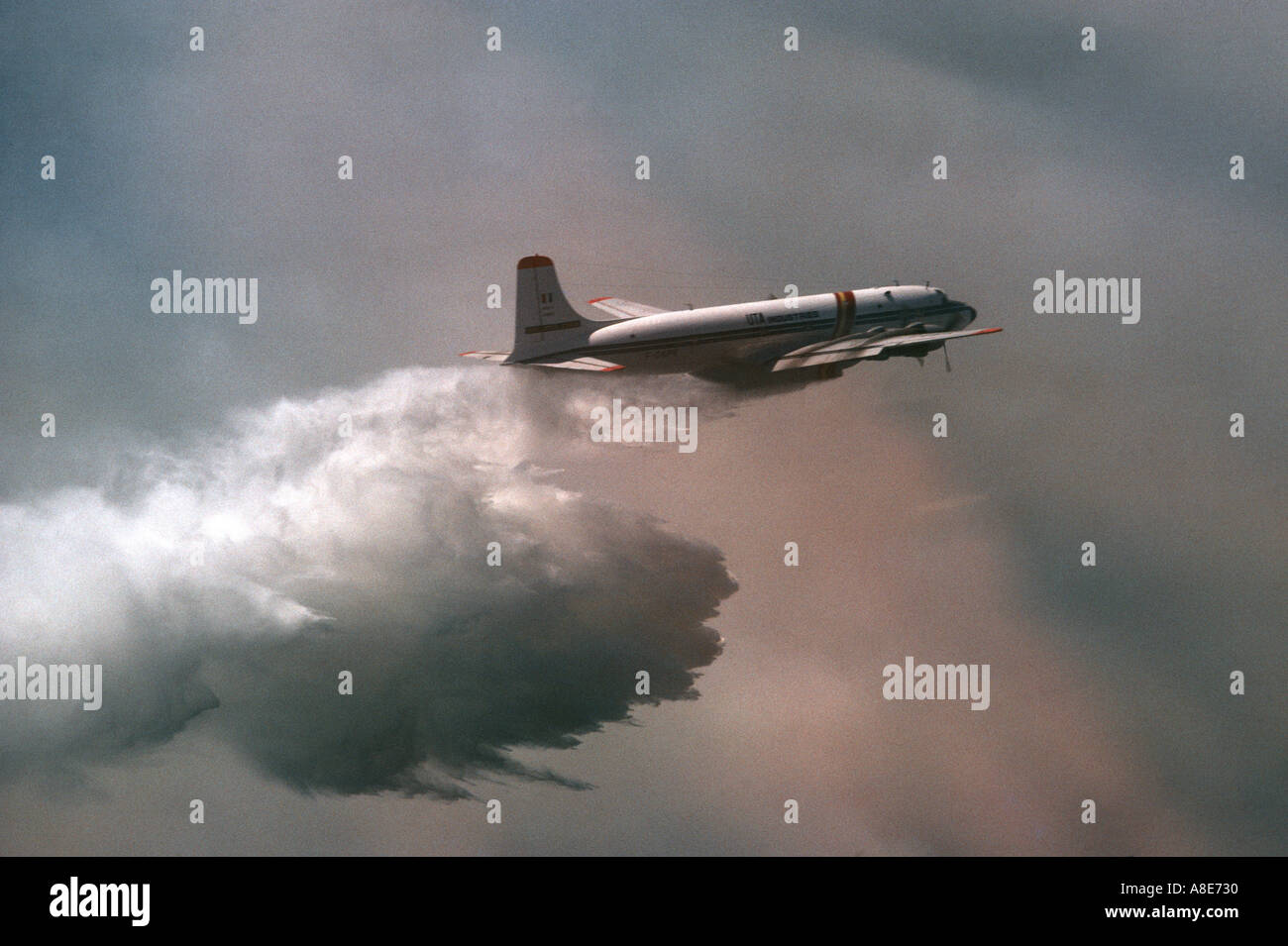 Aerial view of a Douglas DC-6B firefighting water bomber airplane ...