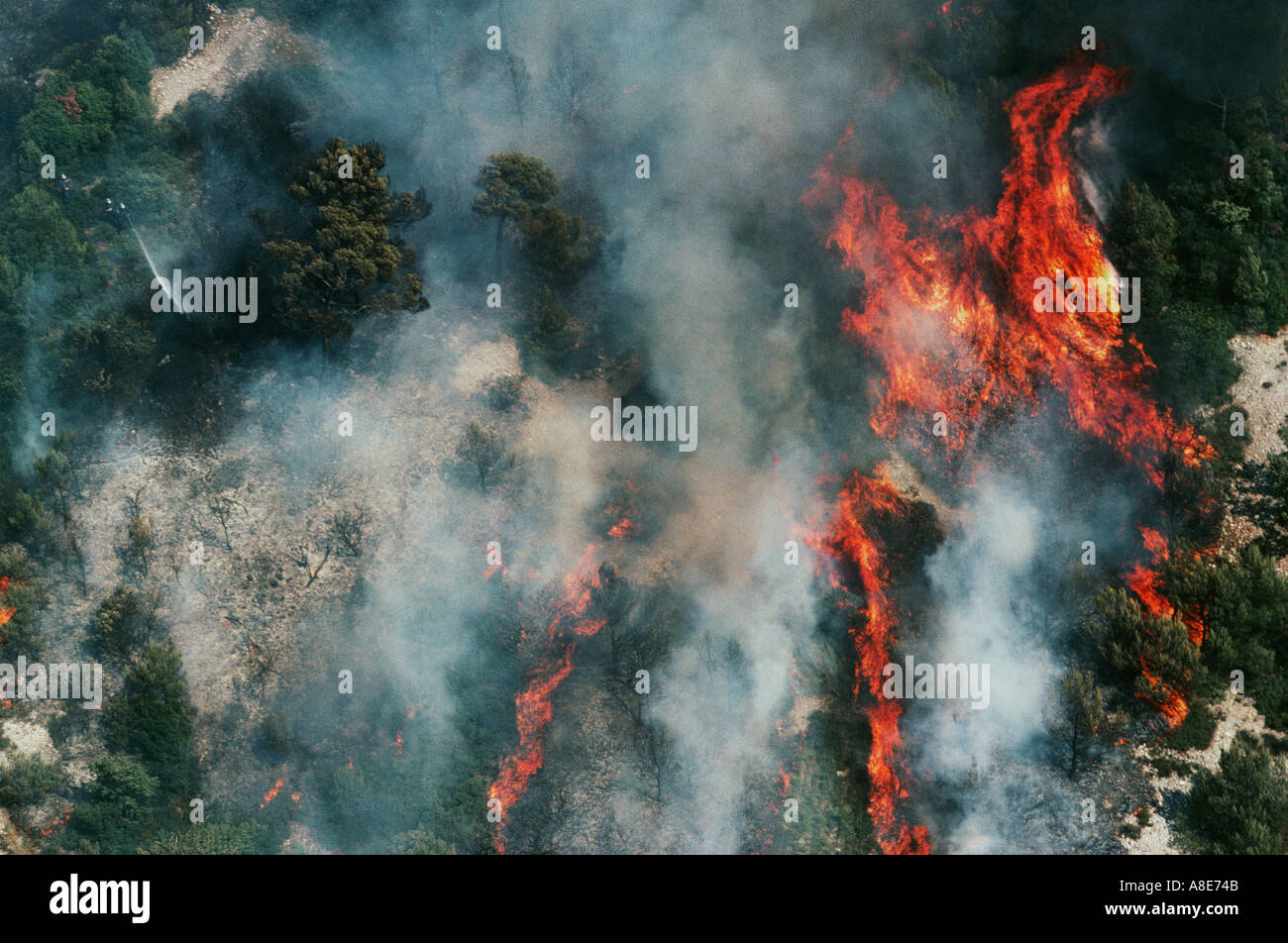 Aerial view of a wildfire, forest fire flames and smoke, Bouches-du ...