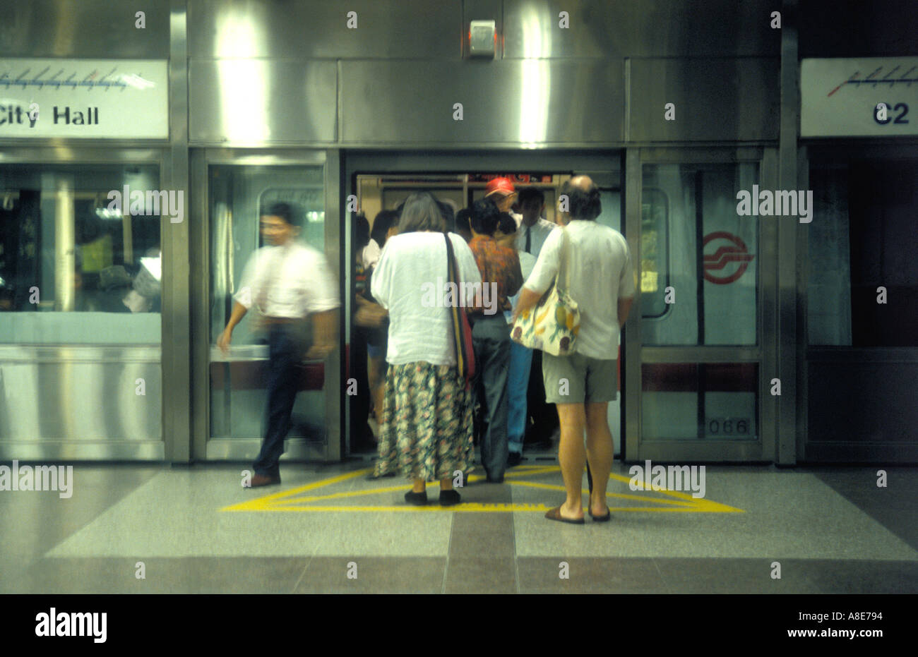 Waiting to board Singapore MRT System Mass Rapid Transport Under ...
