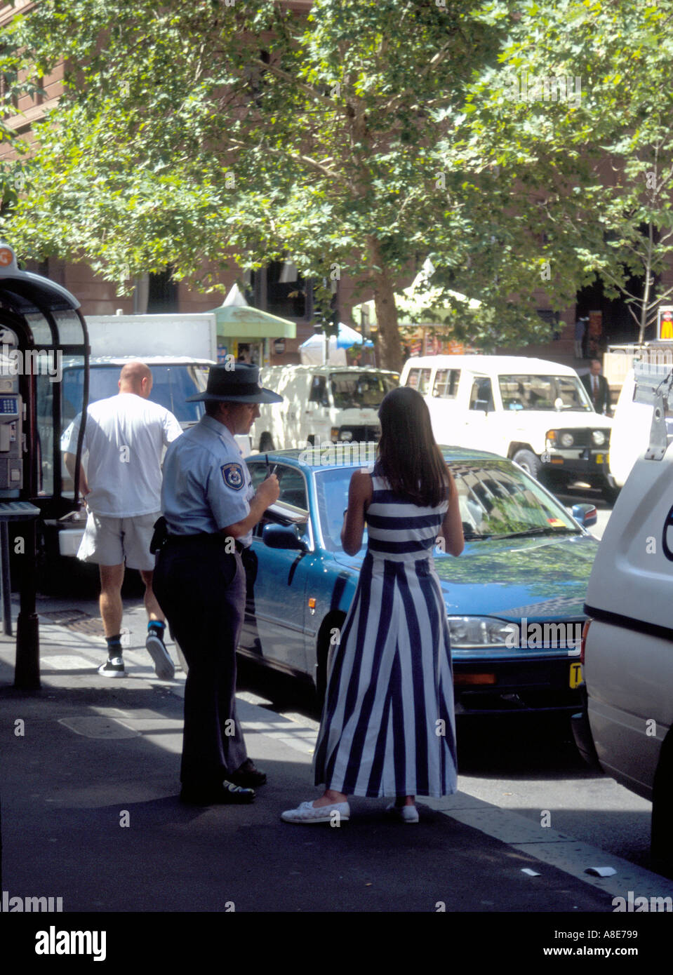 Lady getting parking ticket in Sydney Australia Stock Photo - Alamy
