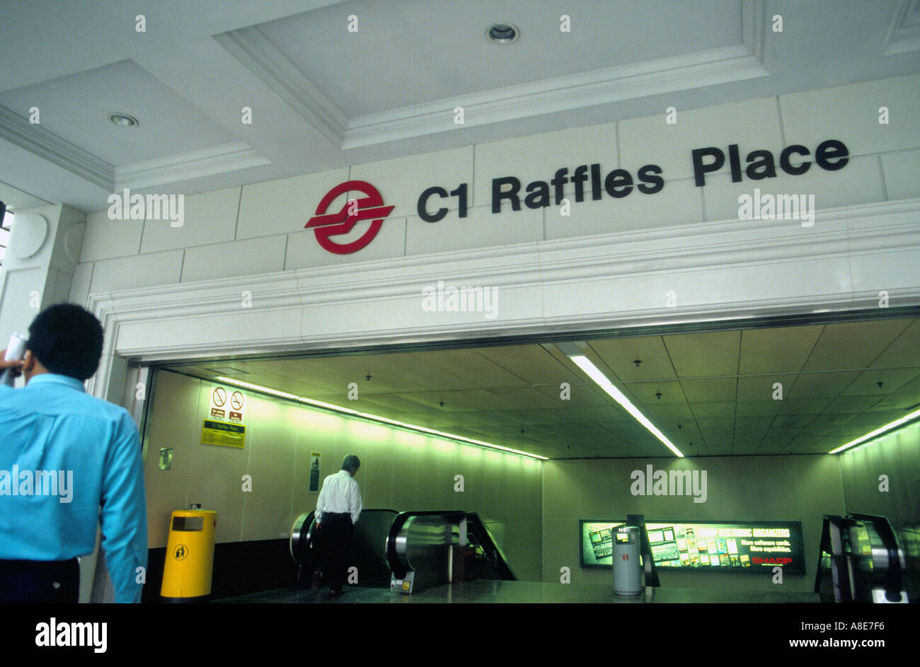 Raffles Place MRT station Singapore Stock Photo - Alamy