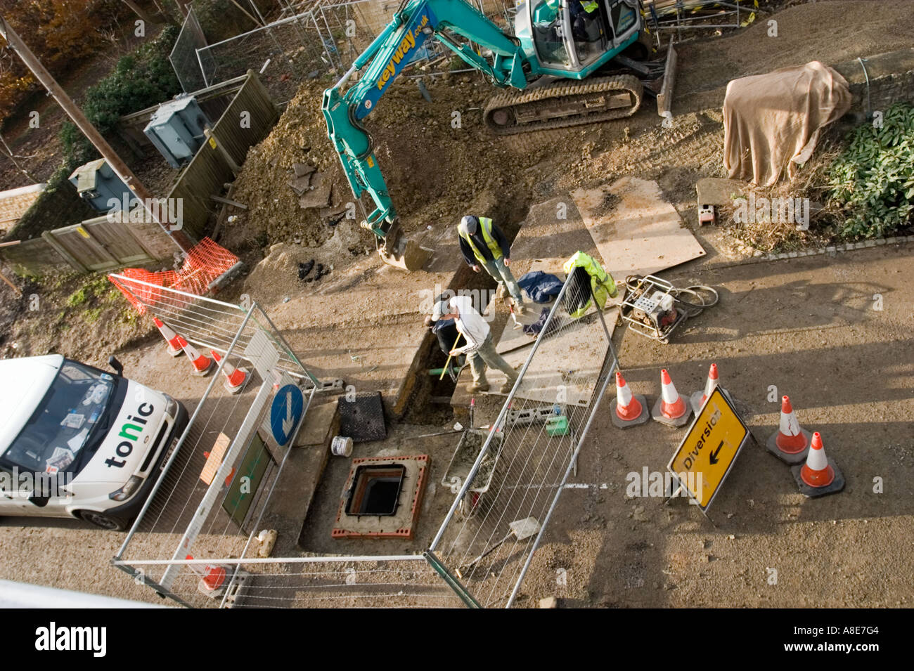 Digging the service trench for a new housing development Stock Photo ...