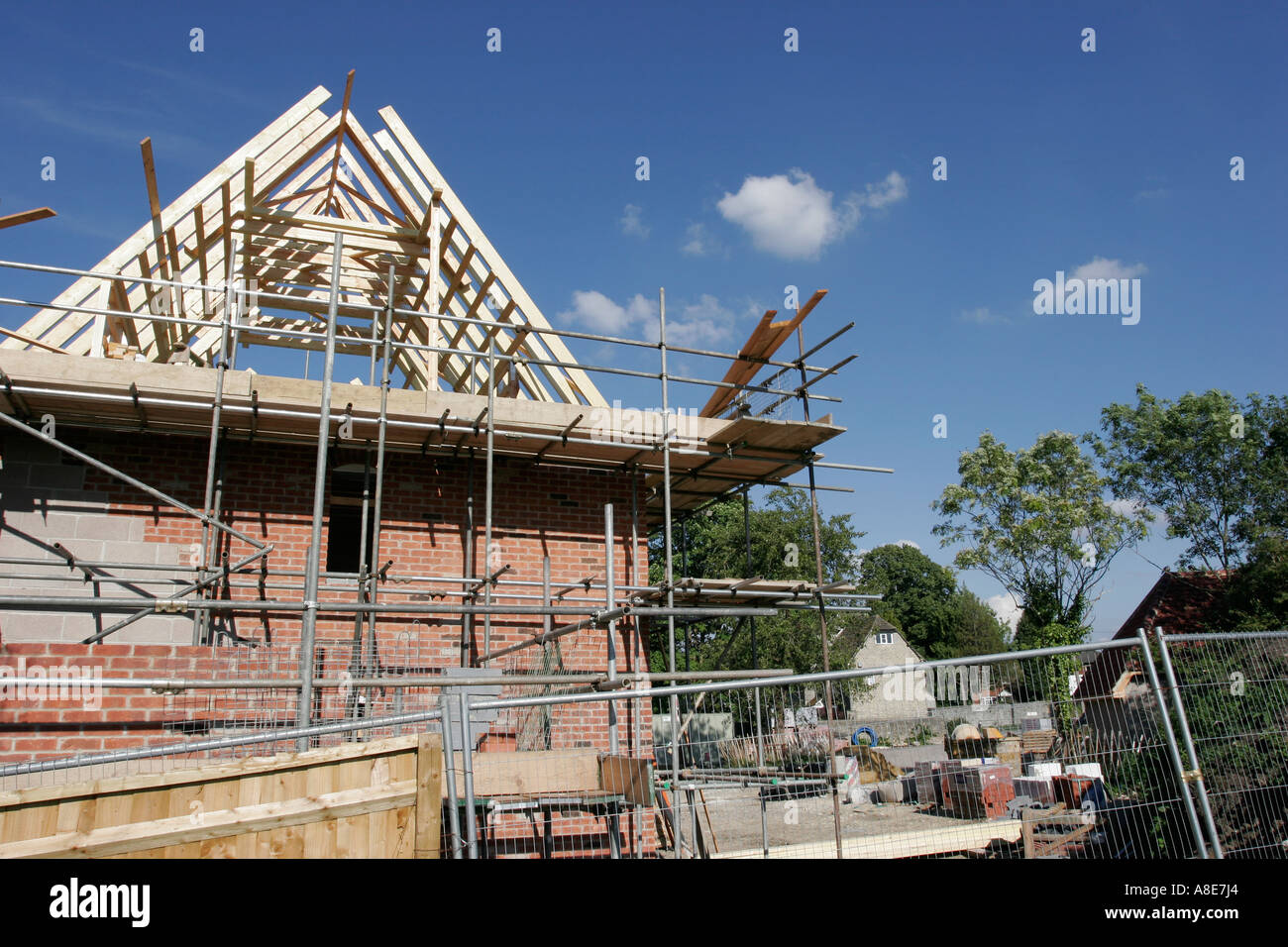 Timber roof structure being added to new homes Stock Photo - Alamy