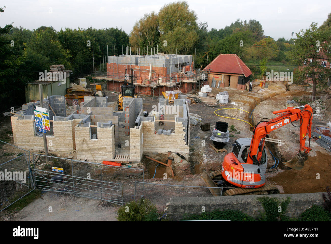 Digging the service trench for a new housing development Stock Photo ...