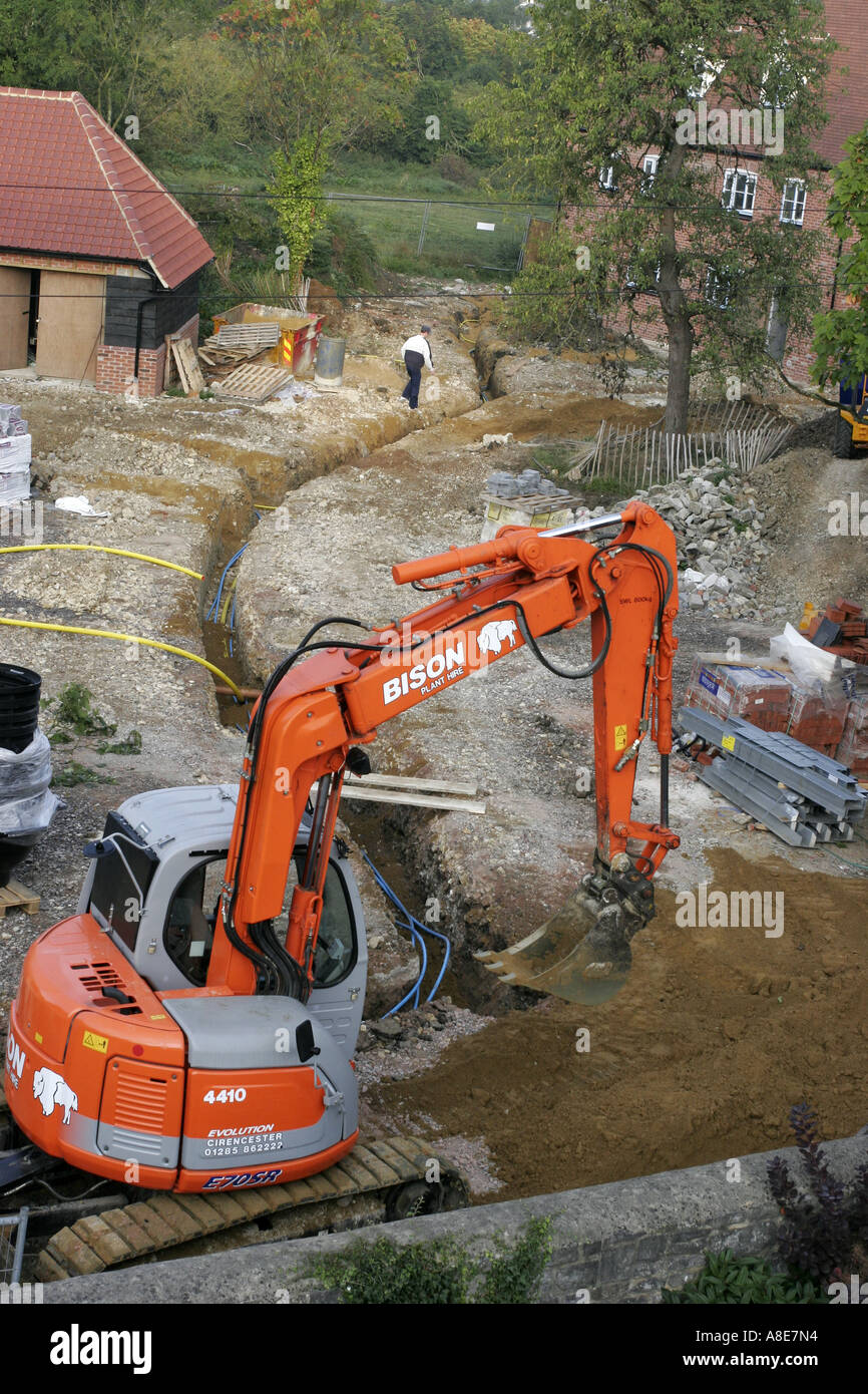 Digging the service trench for a new housing development Stock Photo ...